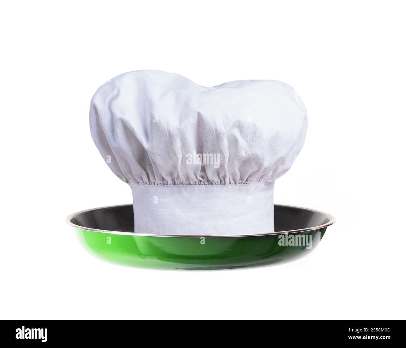 A professional chefs hat on pan - concept. professional chefs hat on ...
