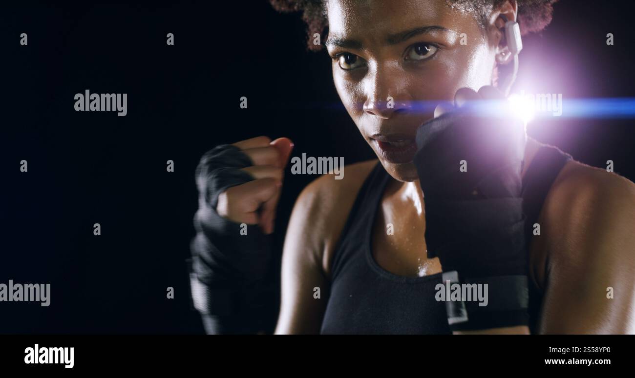 Woman, boxer fighter and studio for exercise, sweating action and lens ...