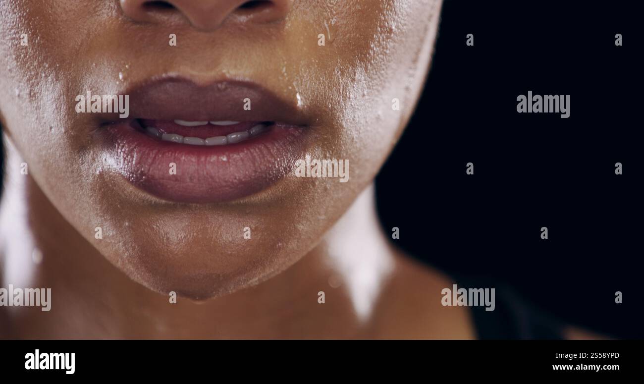 Mouth, sweating and person in gym, fitness and deep breathing for ...