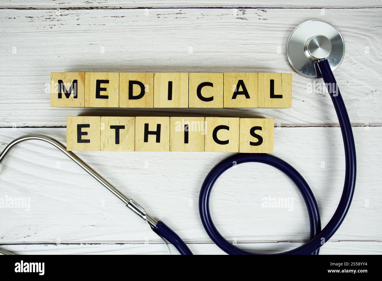 Medical Ethics with wooden blocks alphabet letters and stethoscope on ...