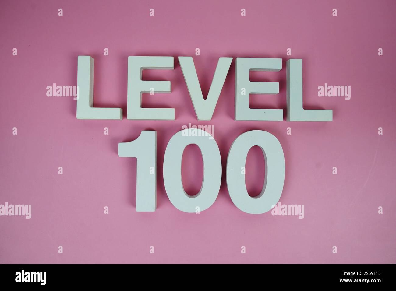 Level 100 Level One hundred alphabet letters on pink background Stock ...