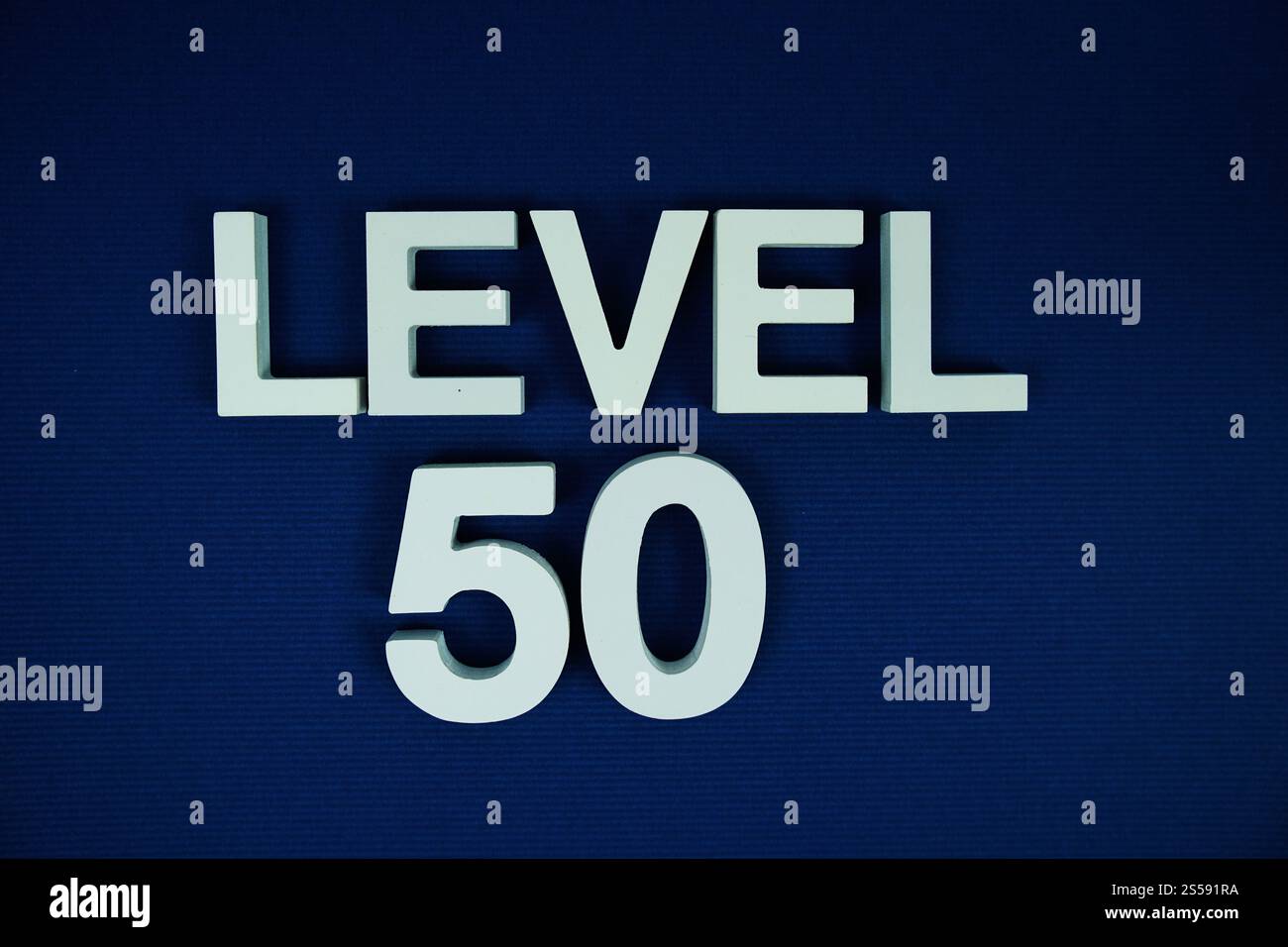 Level 50 Level Fifty alphabet letters on navy blue background Stock ...
