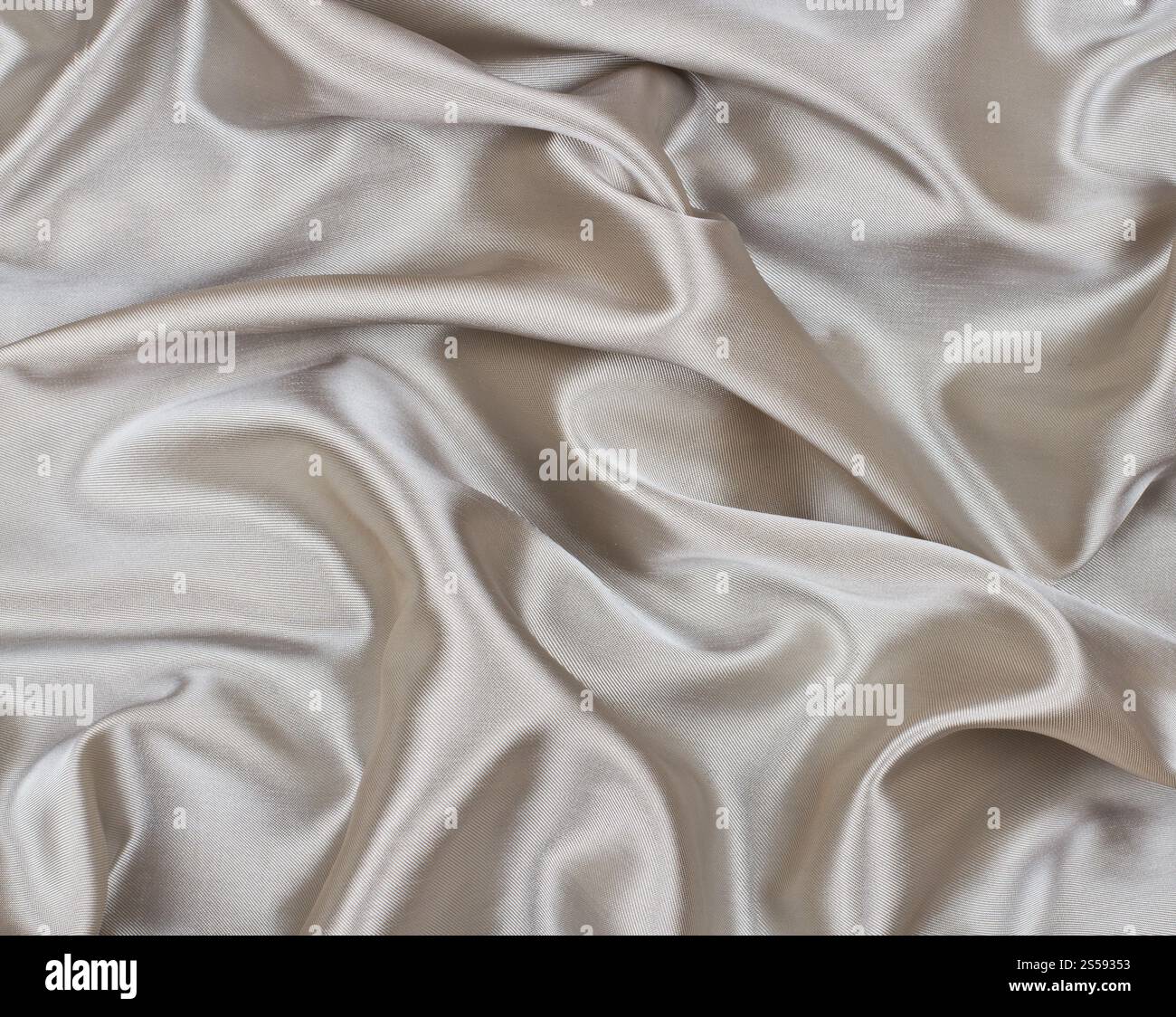 white satin fabric as a background or texture. white satin fabric as a ...