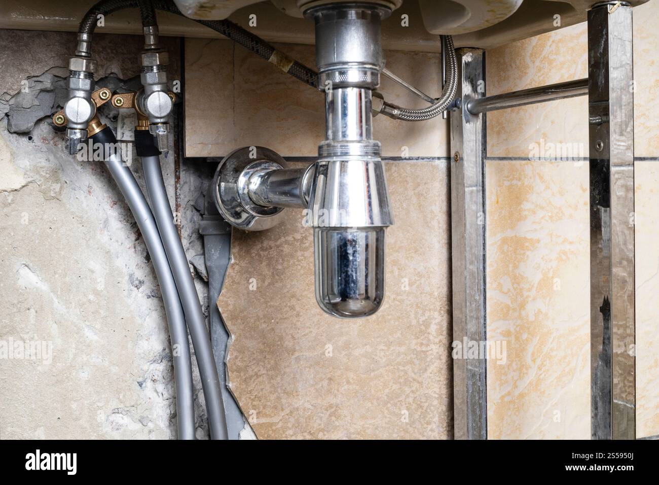 new high density polyethylene water pipes connected to valves of sink ...