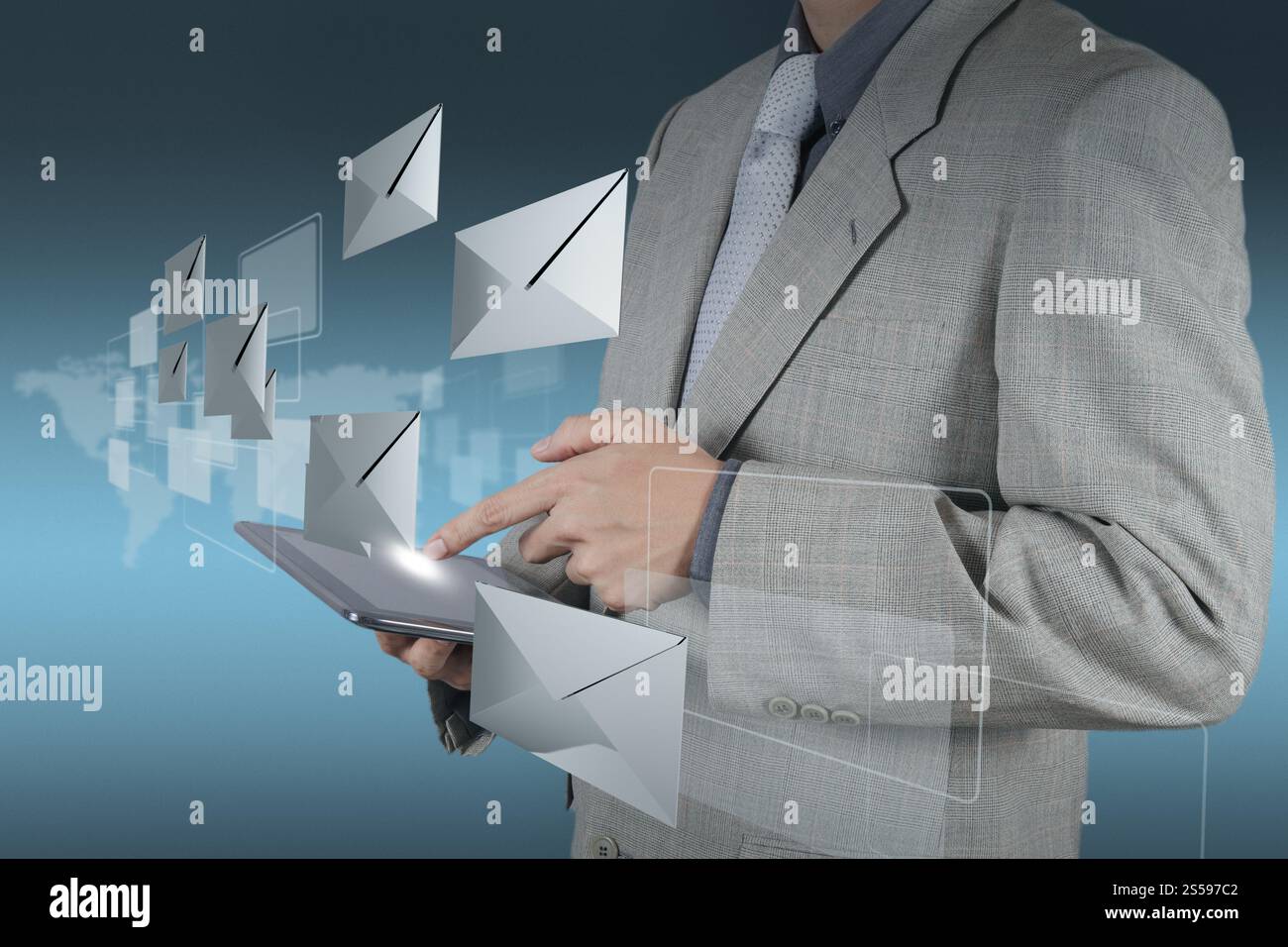 businessman hand use tablet computer with email icon Stock Photo - Alamy