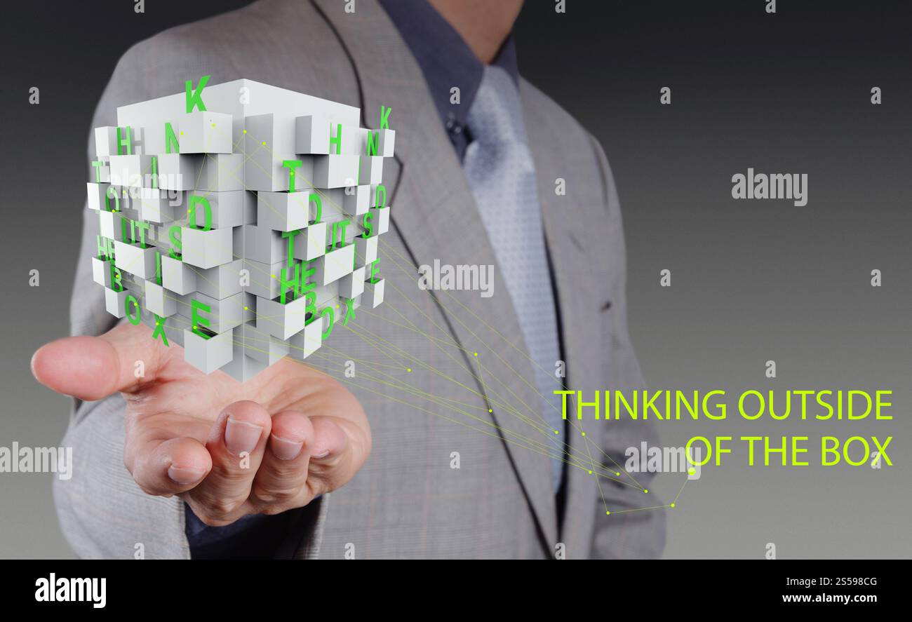 businessman hand shows word thinking outside the box as concept Stock ...