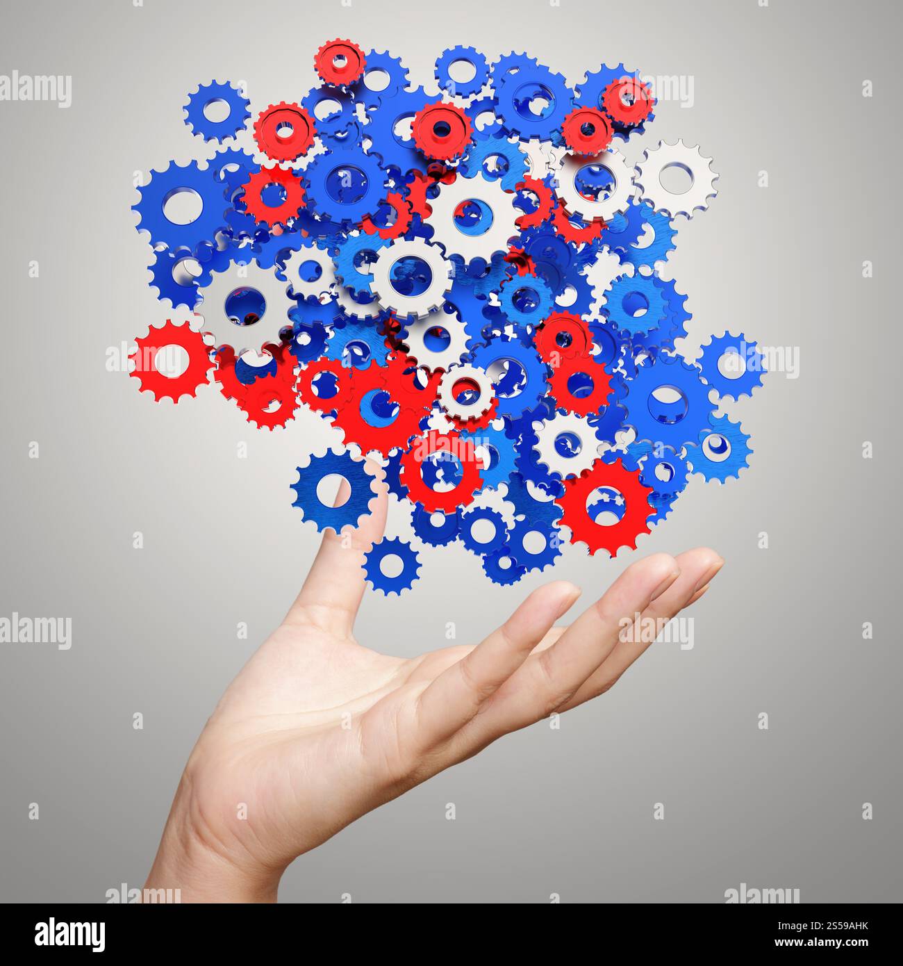 businessman hand showing gears cogs to success concept Stock Photo - Alamy