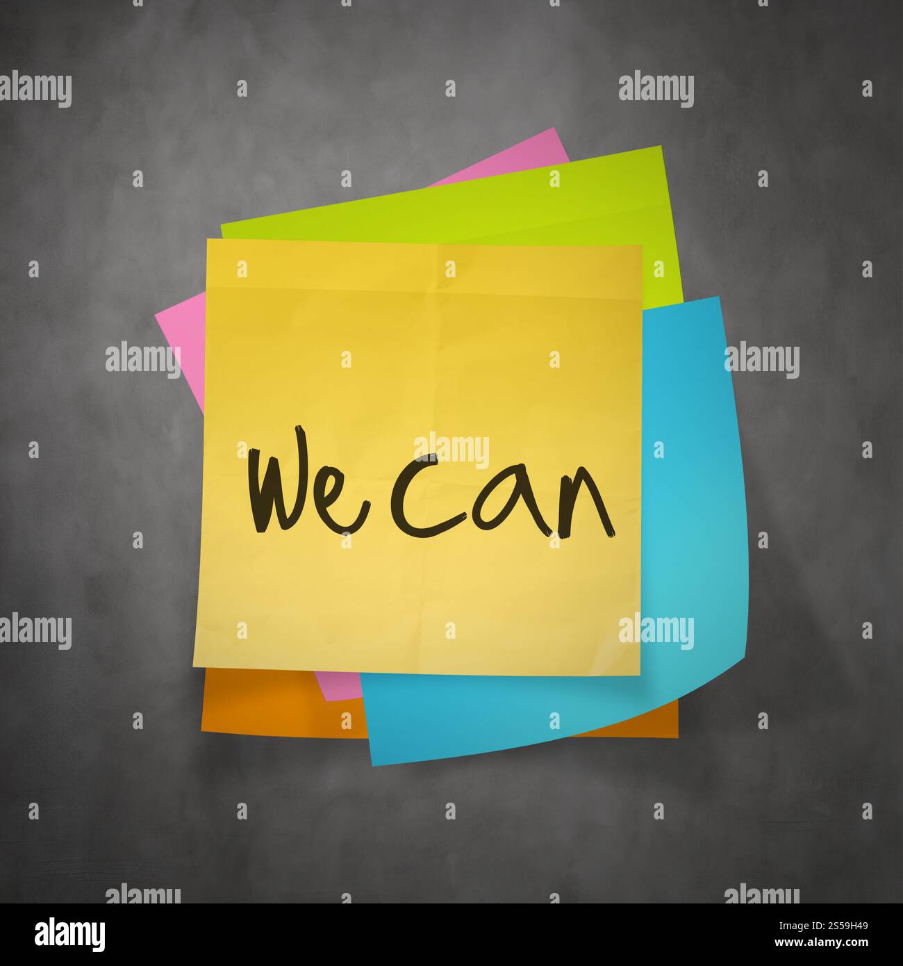 we can" text on sticky note paper on wall texture Stock Photo - Alamy