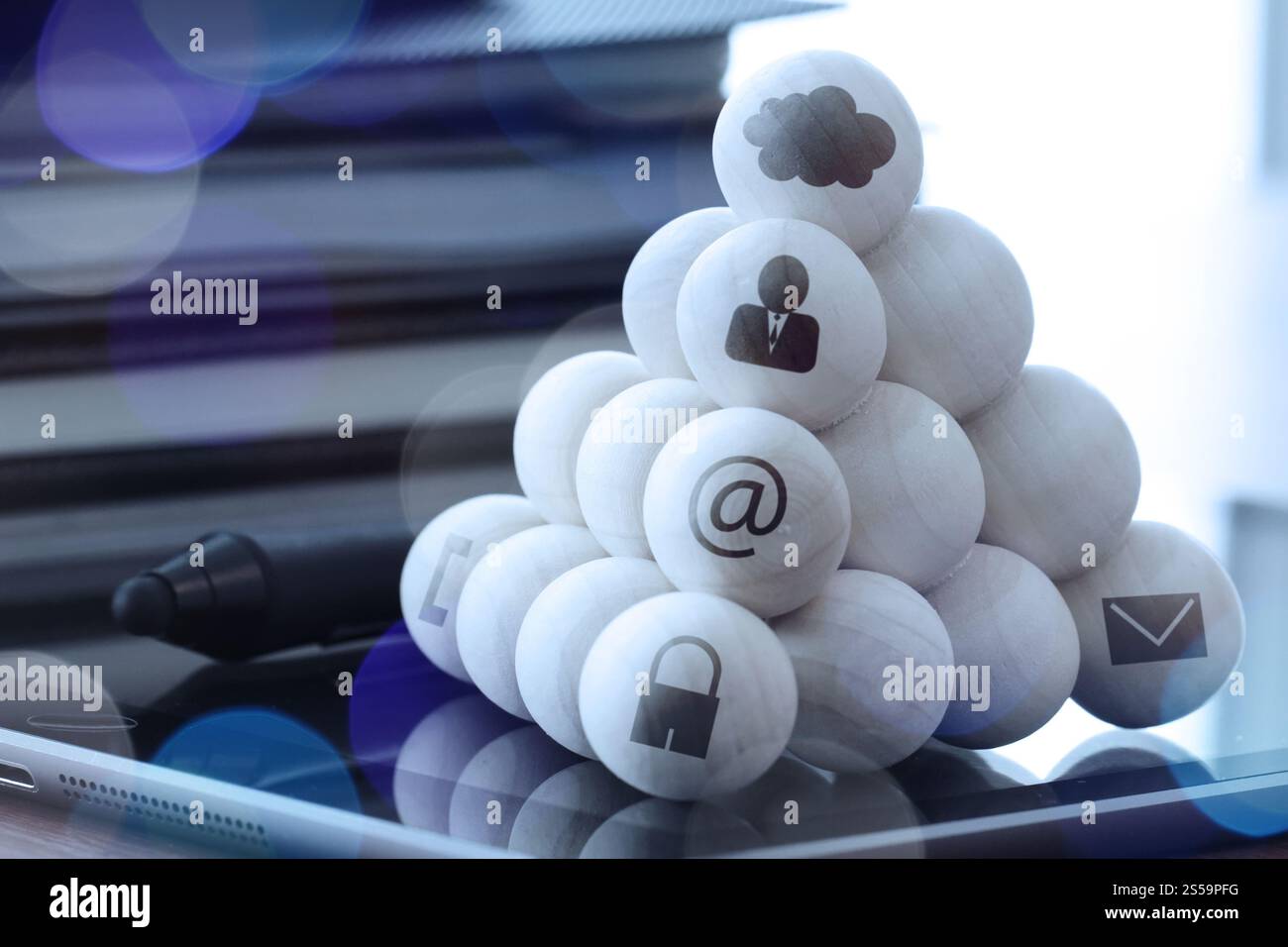 wooden balls with technology icons on computer as cloud network concept ...