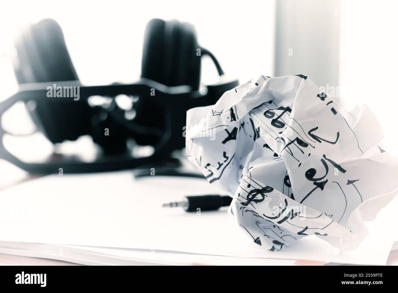 composing music concept with shallow DOF evenly matched crumpled ...