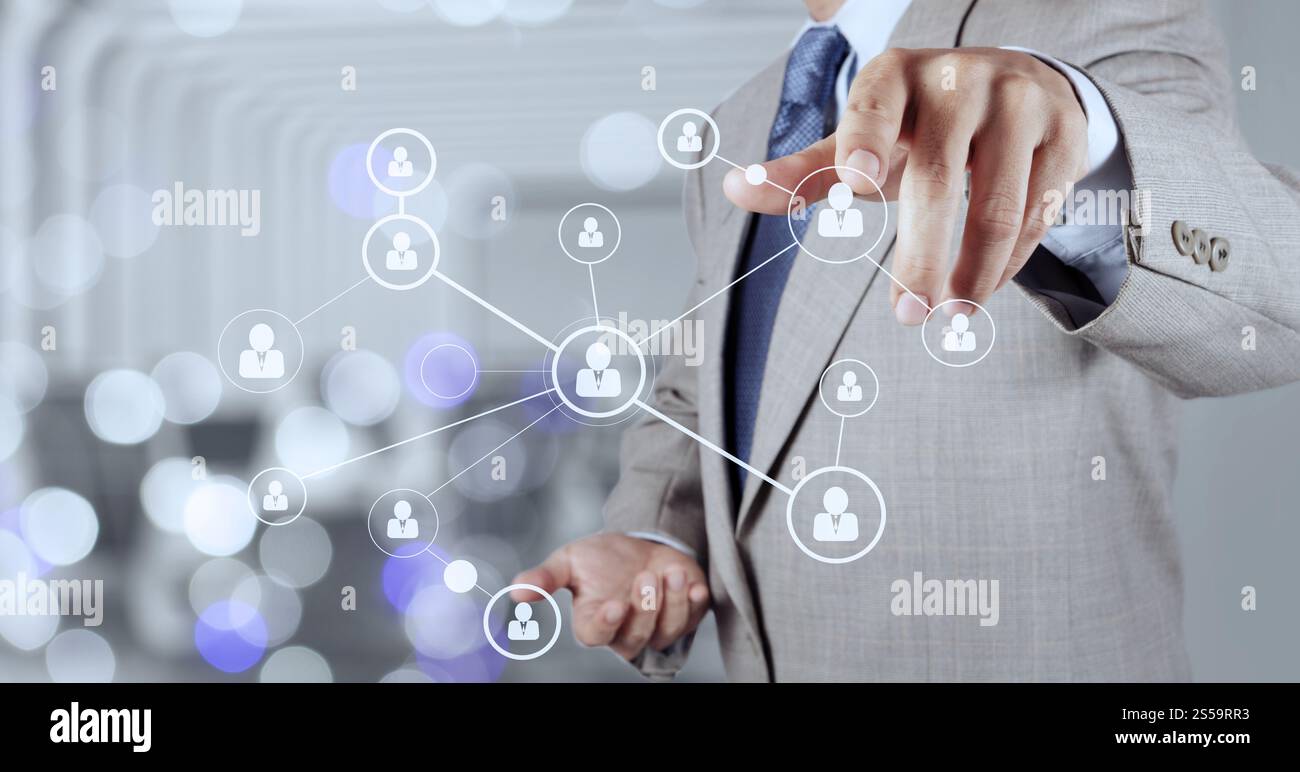 businessman hand showing human icon flow chart on new modern computer ...