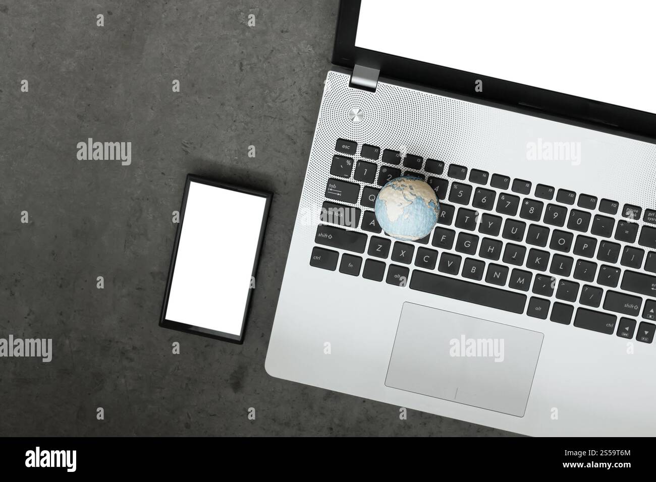 hand drawn texture globe with blank screen laptop computer and smart ...