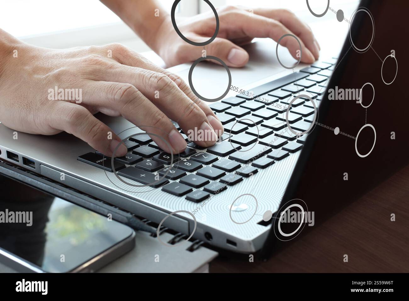 Close up of business man hand working on laptop computer with social ...