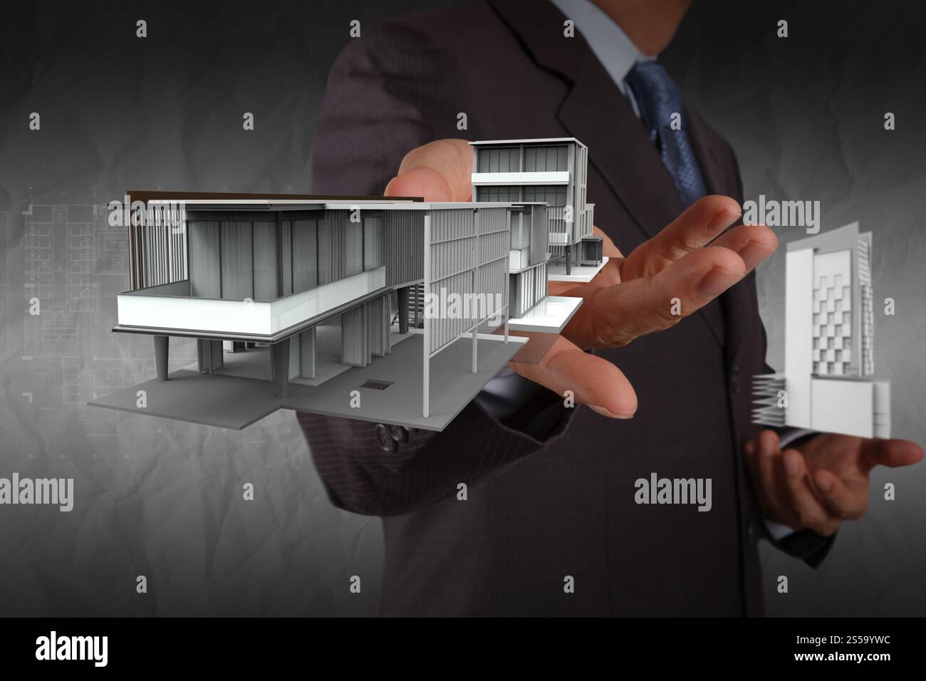 businessman hand shows house model with crumpled paper background as ...