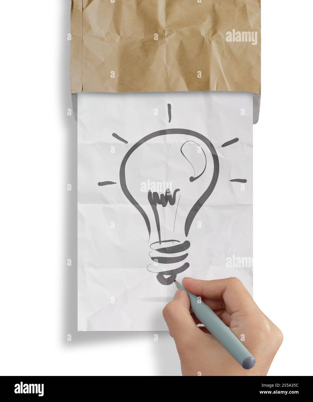 hand draws light bulb crumpled paperfrom recycle envelope as creative ...