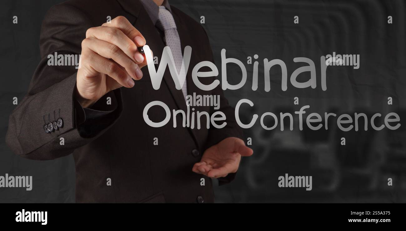 businessman hand writing Webinar with crumpled paper background as ...