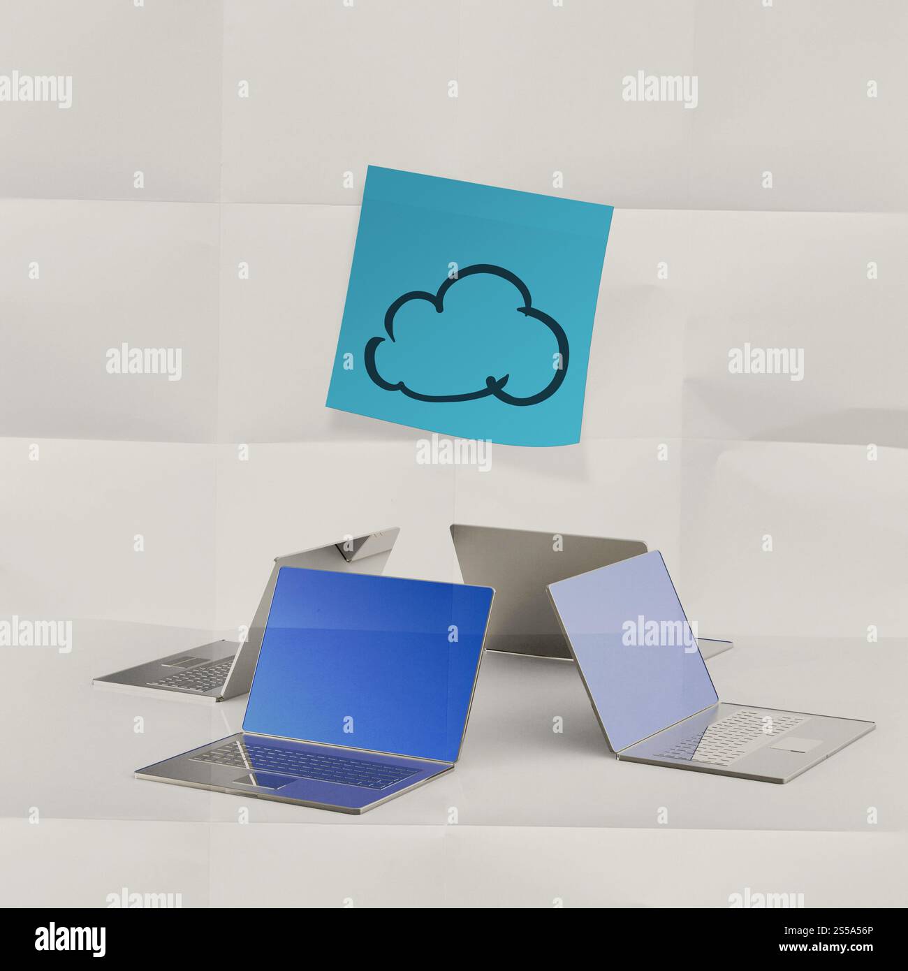 sticky note on crumpled paper with laptop computer and cloud network ...