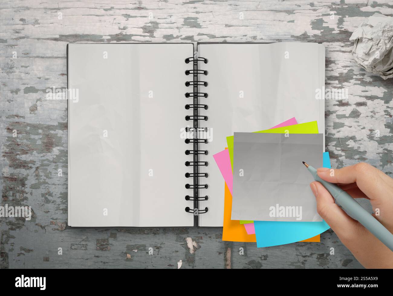 sticky notes with open blank note book on desk top texture Stock Photo ...