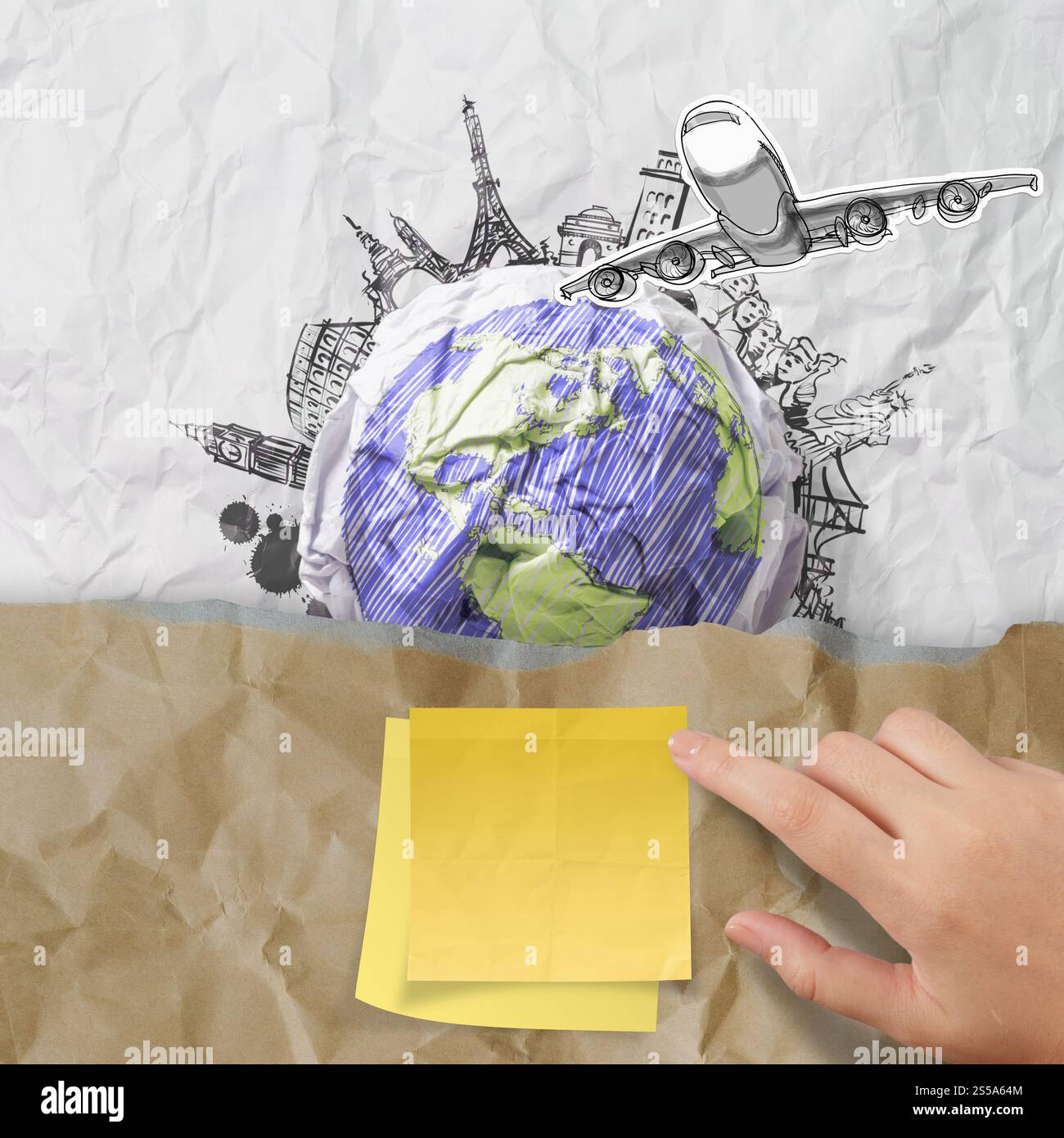 sticky note on recycle envelope with crumpled paper and traveling ...