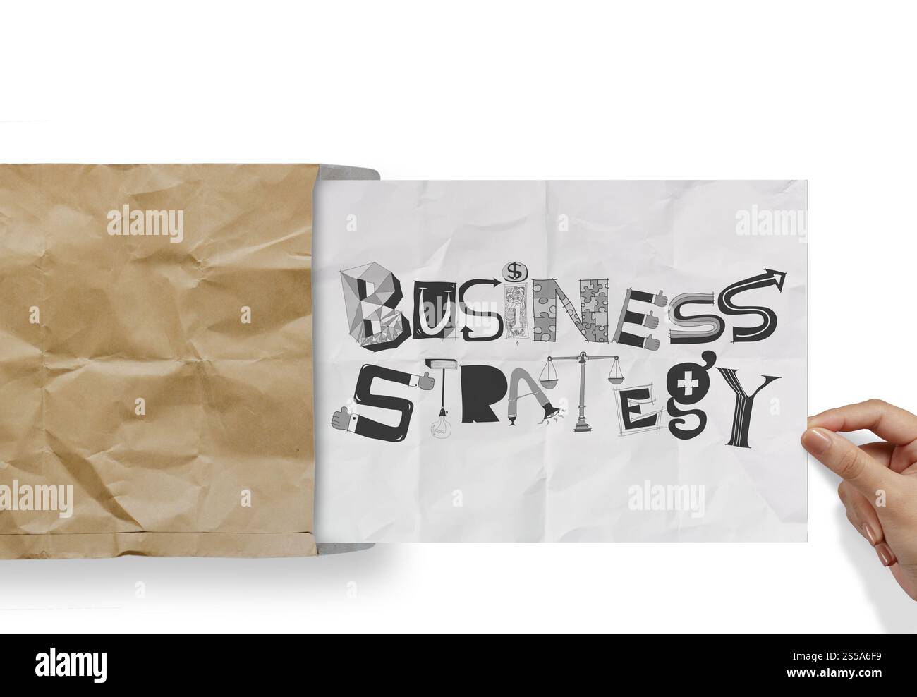 hand pulling crumpled paper from envelope with design word BUSINESS ...