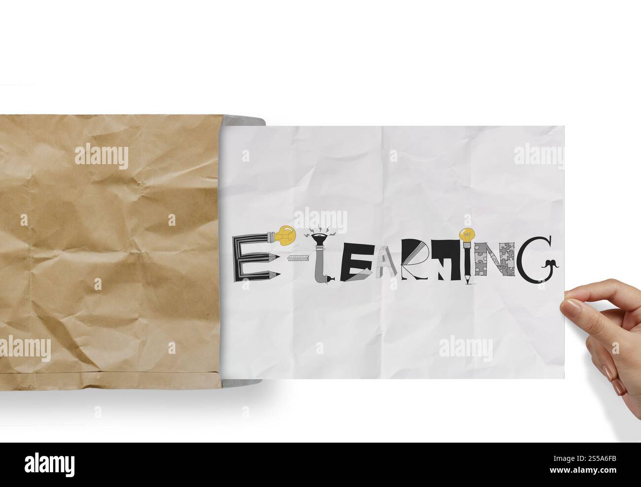 hand pulling crumpled paper from envelope with design word E-LEARNING ...
