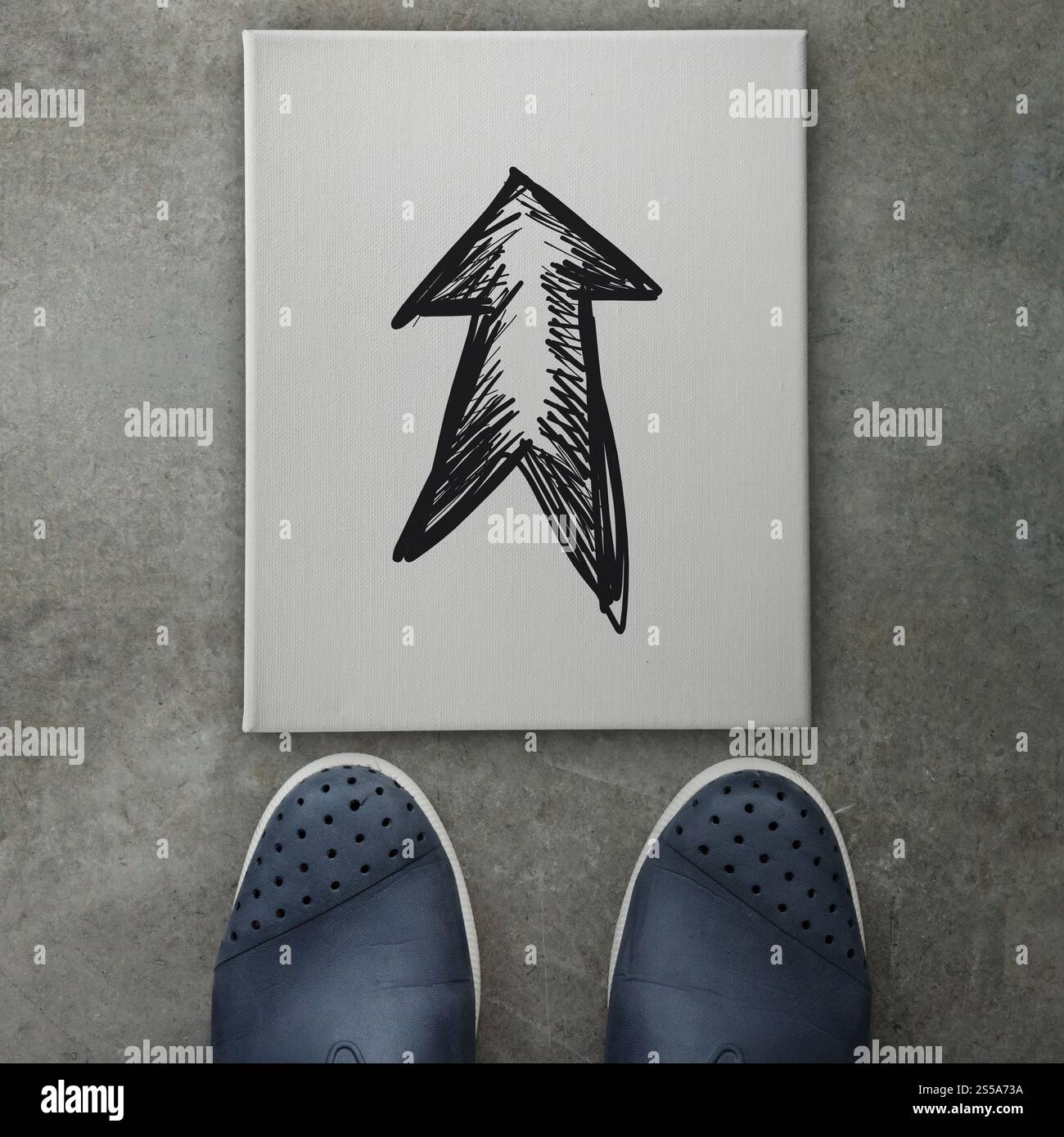 Hand drawn arrow design doodle icon on front of business man feet as ...