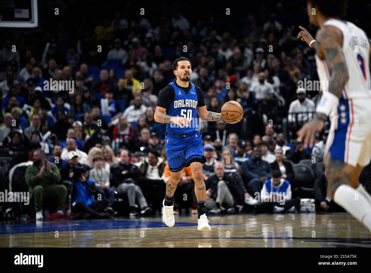 Orlando Magic guard Cole Anthony (50) brings the ball up the court ...