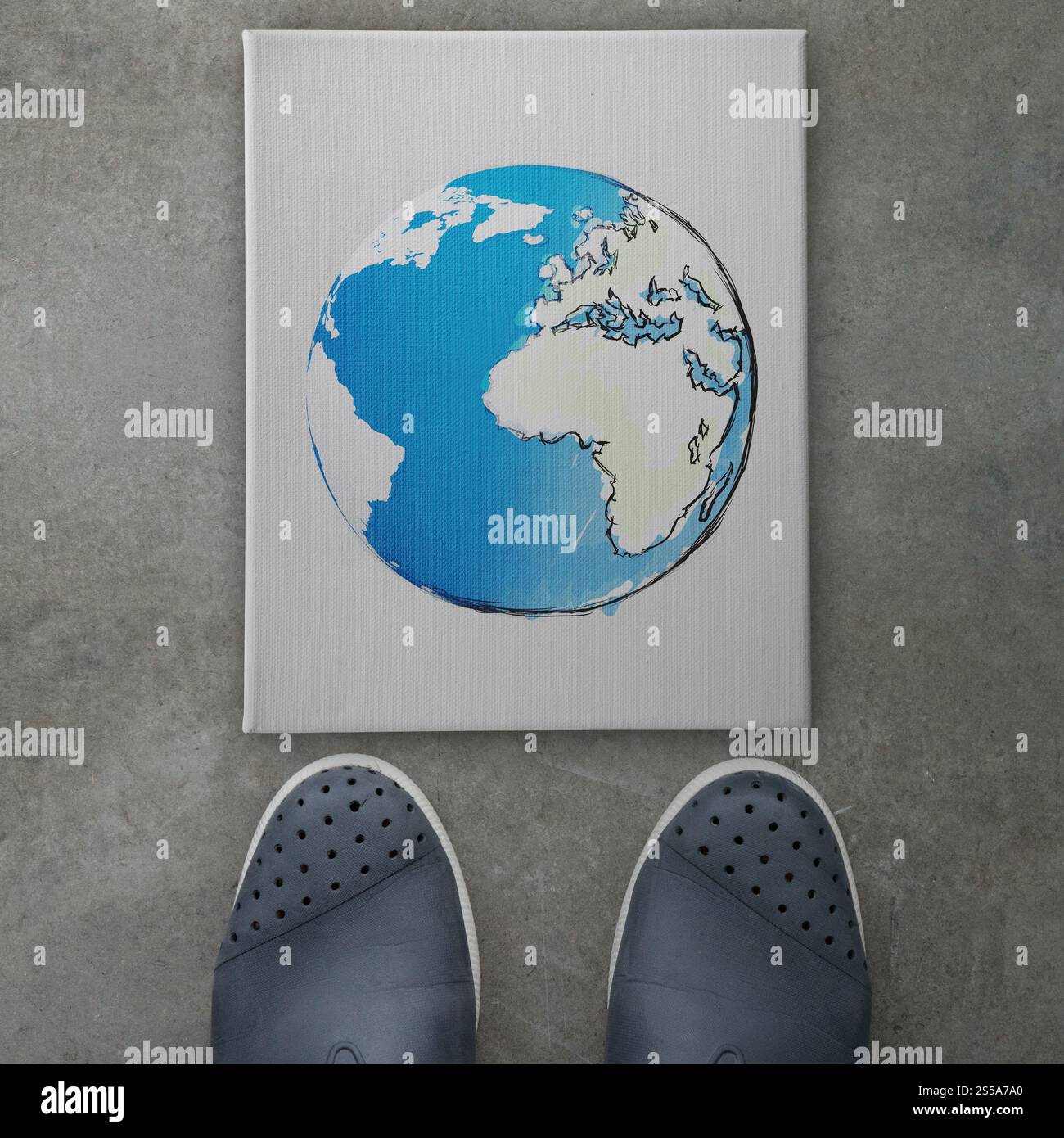 hand drawn abstract globe on front of business man feet as concept ...