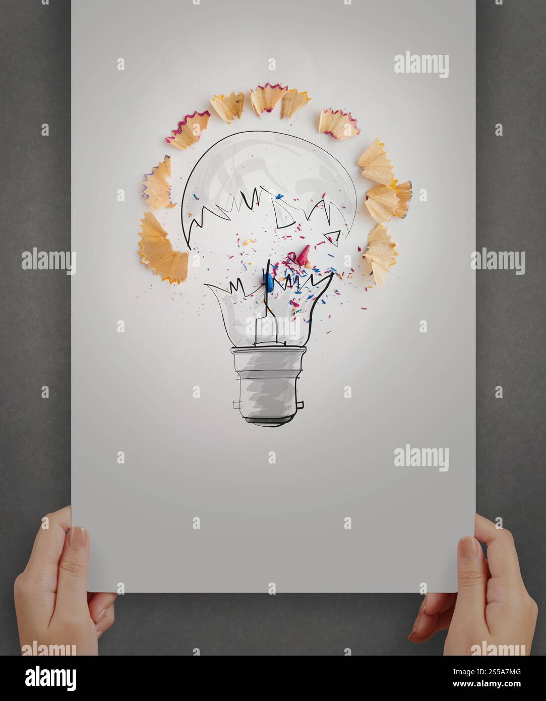 hand drawn light bulb with pencil saw dust on paper background as ...