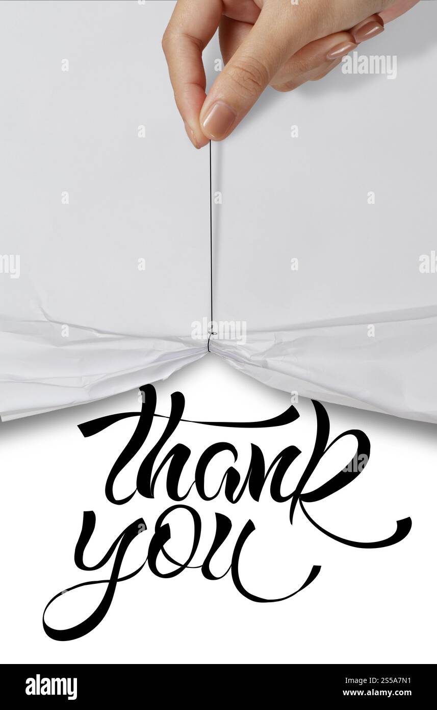 business hand pull rope open wrinkled paper show THANK YOU design text ...