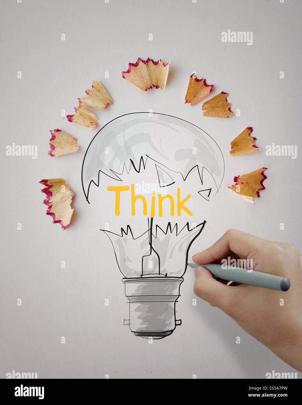hand drawn light bulb word design THINK with pencil saw dust on paper ...