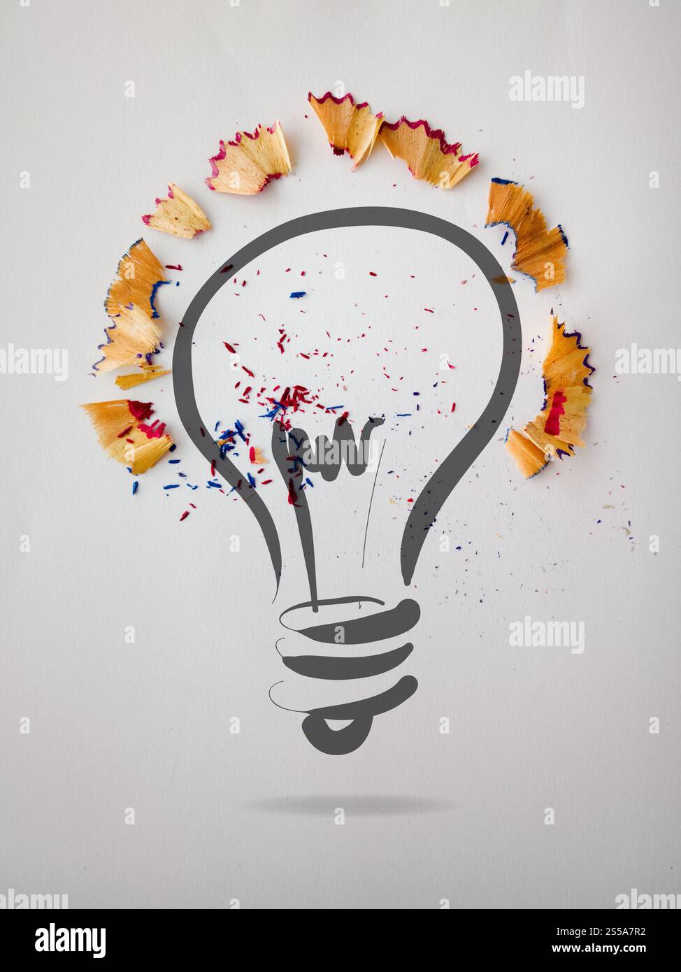 hand drawn light bulb with pencil saw dust on paper background as ...