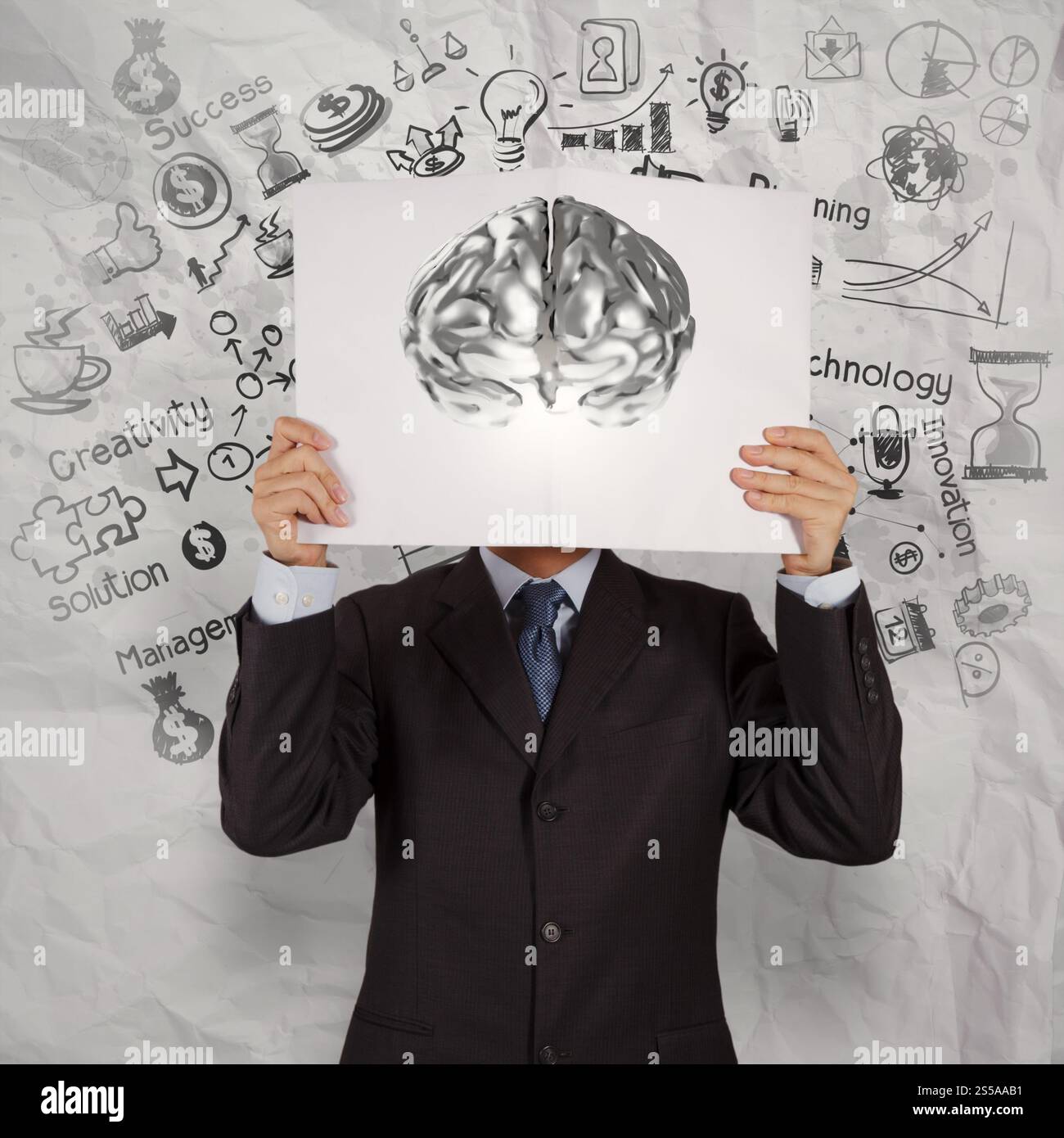 businessman hand show book of 3d metal brain as concept Stock Photo - Alamy