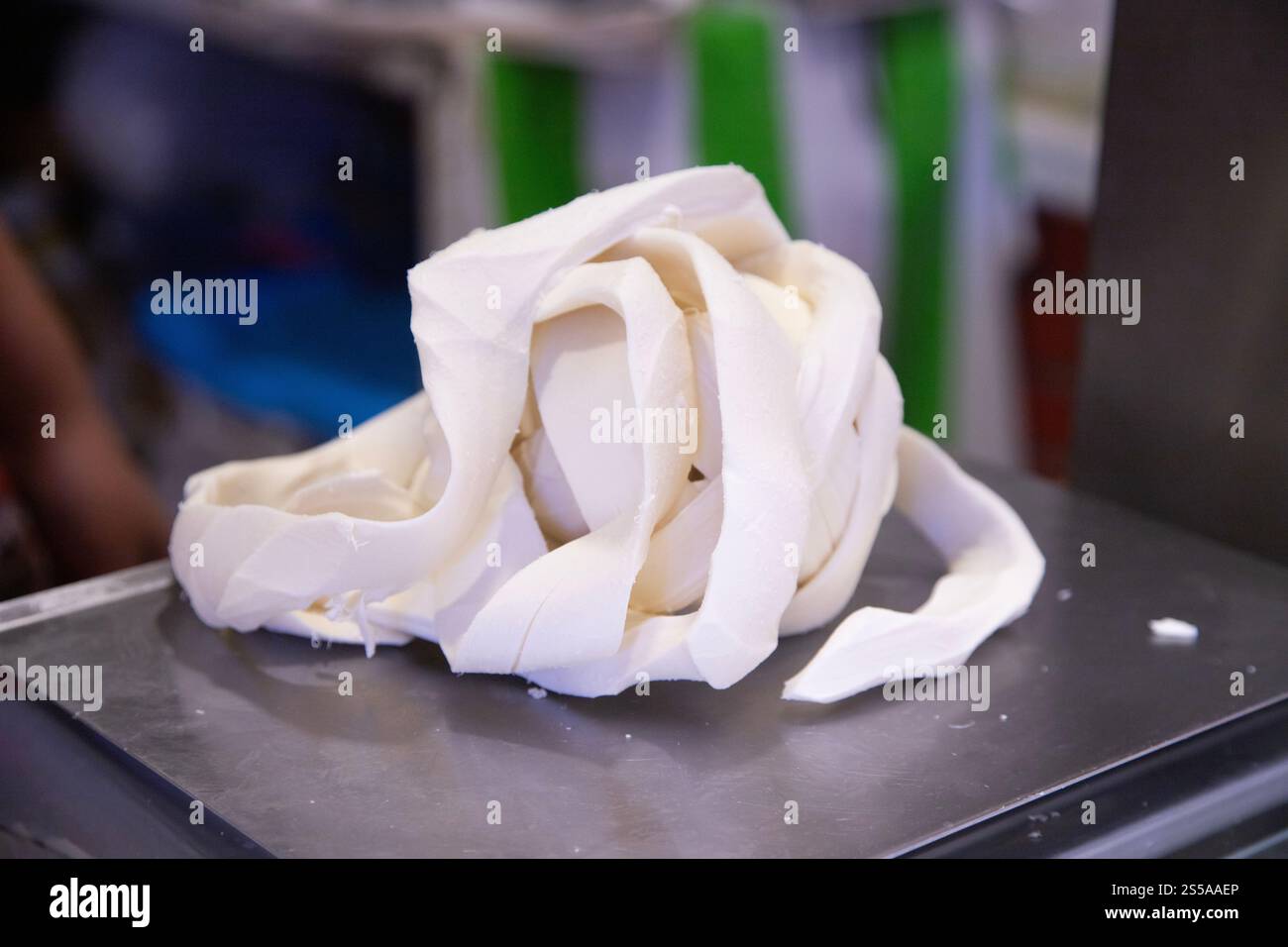 Oaxaca cheese, quesillo or string cheese is a fresh and soft cheese ...