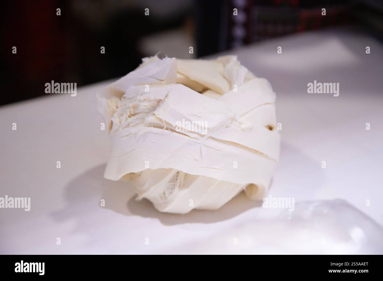 Oaxaca cheese, quesillo or string cheese is a fresh and soft cheese ...