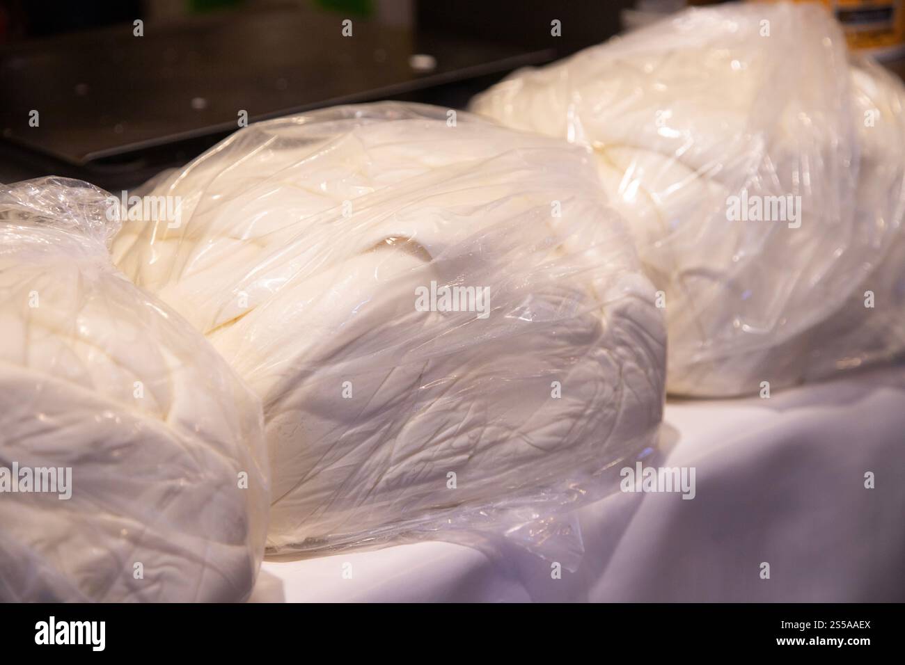 Oaxaca cheese, quesillo or string cheese is a fresh and soft cheese ...