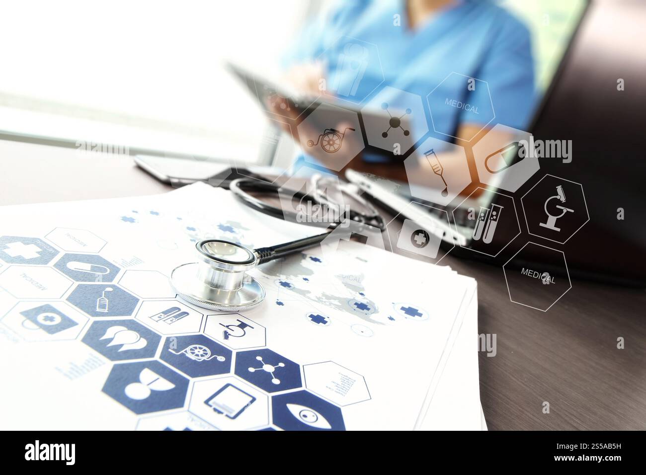 Doctor working with laptop computer in medical workspace office and ...