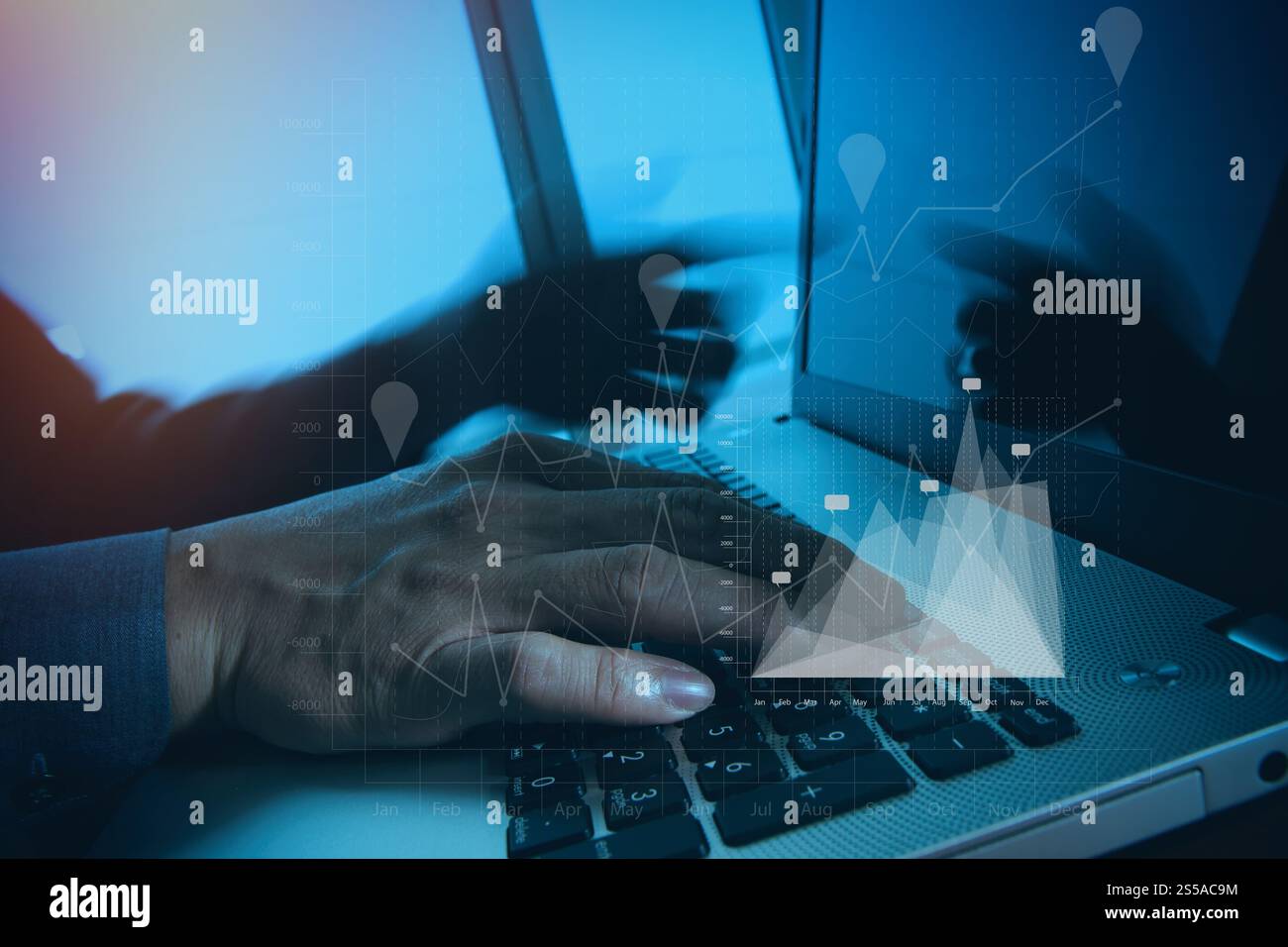 close up of business man hand working on laptop computer with business ...