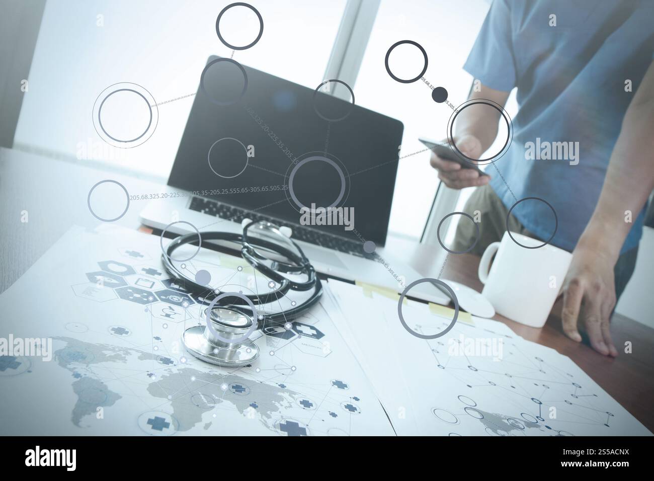 Doctor working with laptop computer in medical workspace office and ...