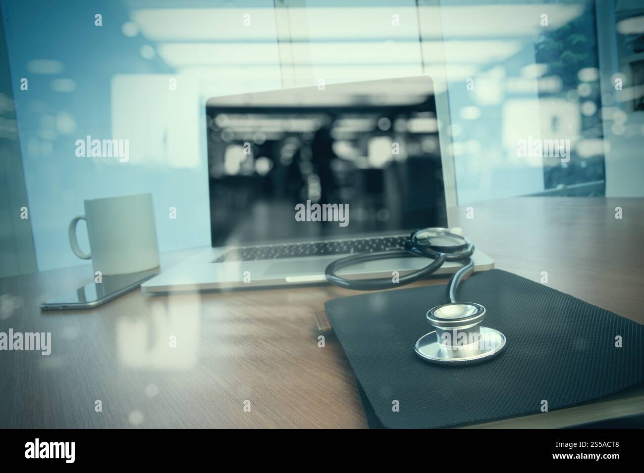 Doctor workspace with laptop computer in medical workspace office and ...