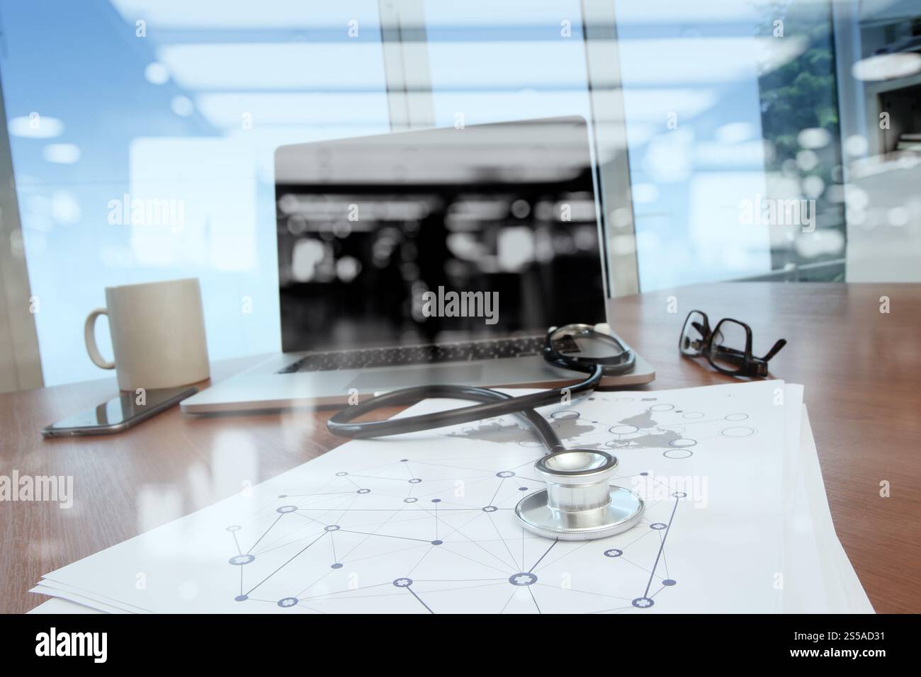 Doctor workspace with laptop computer in medical workspace office and ...