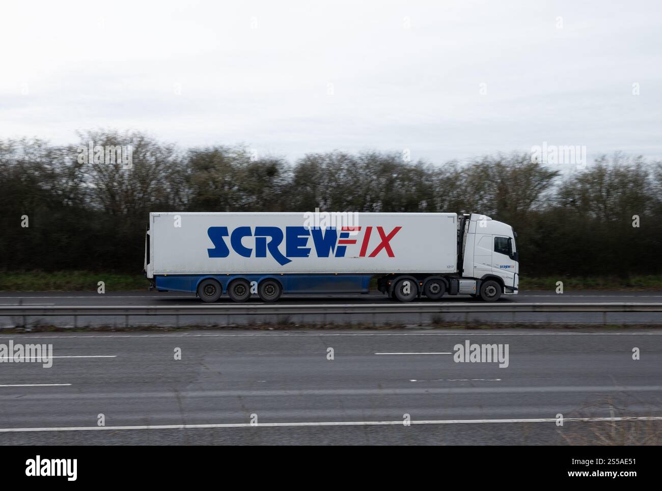 Screwfix lorry on the M40 motorway, Warwickshire, UK Stock Photo - Alamy
