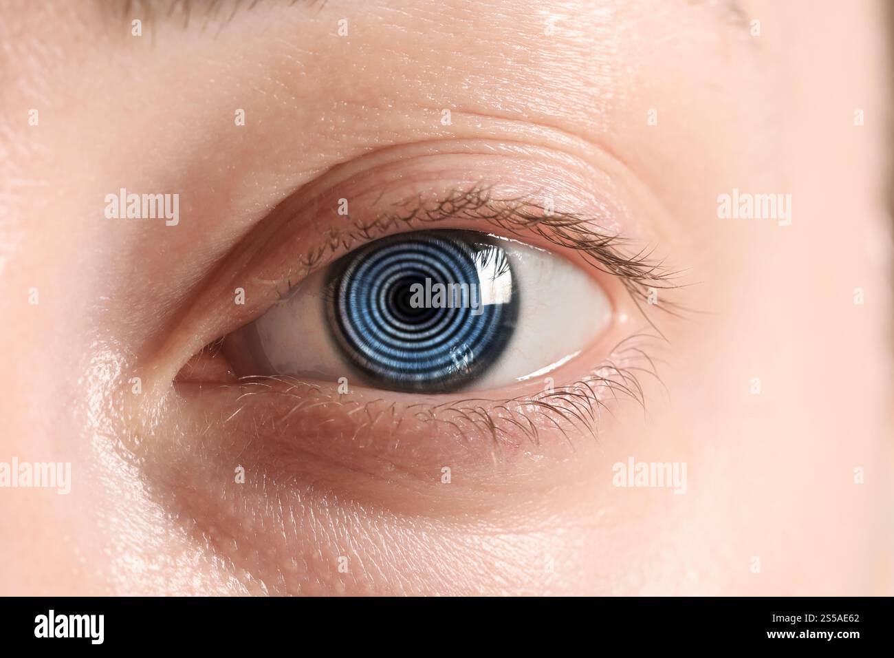 Hypnosis. Spiral symbolizing hypnotic effect in woman's eye, closeup ...