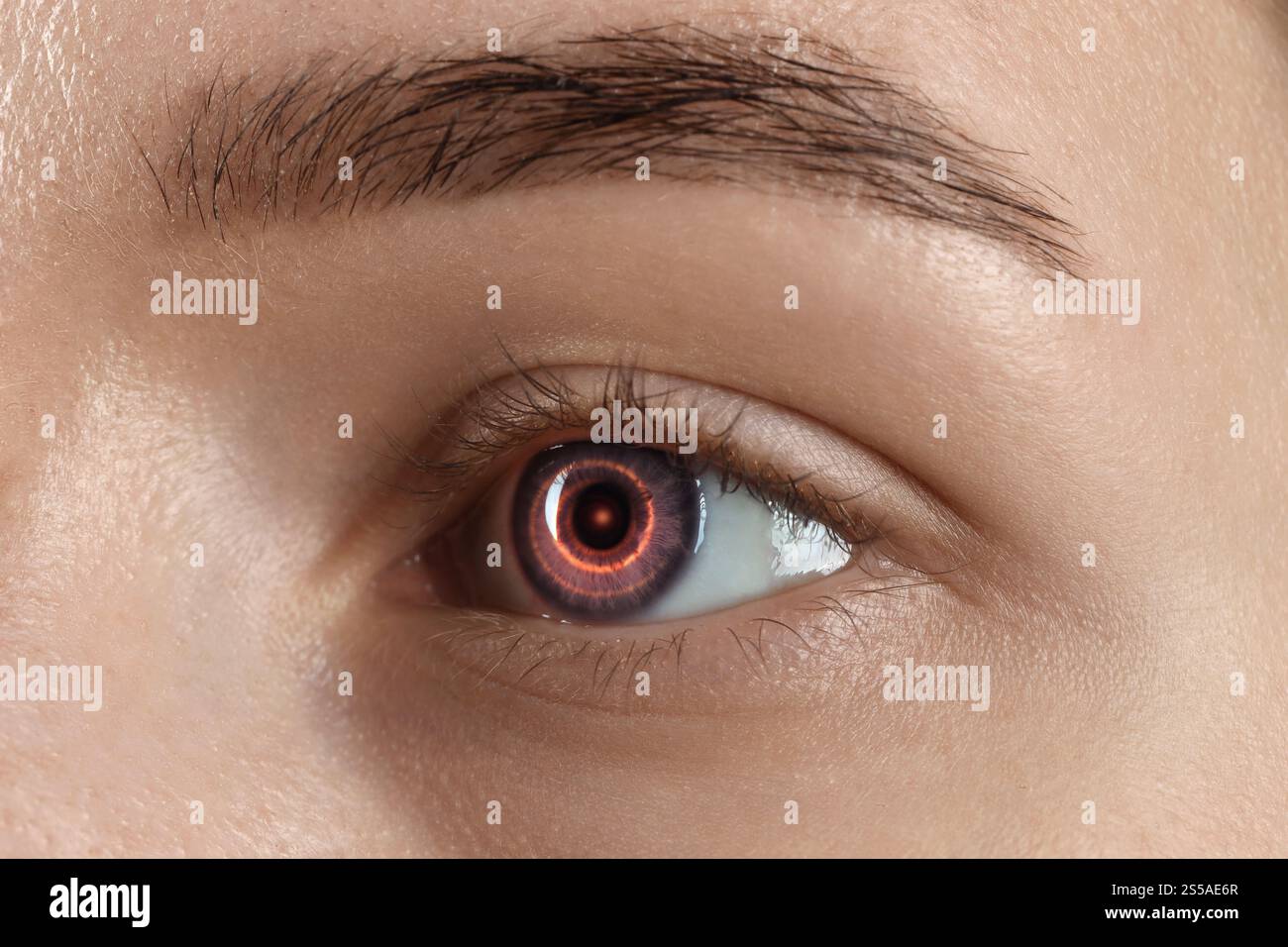 Hypnosis. Spiral symbolizing hypnotic effect in woman's eye, closeup ...