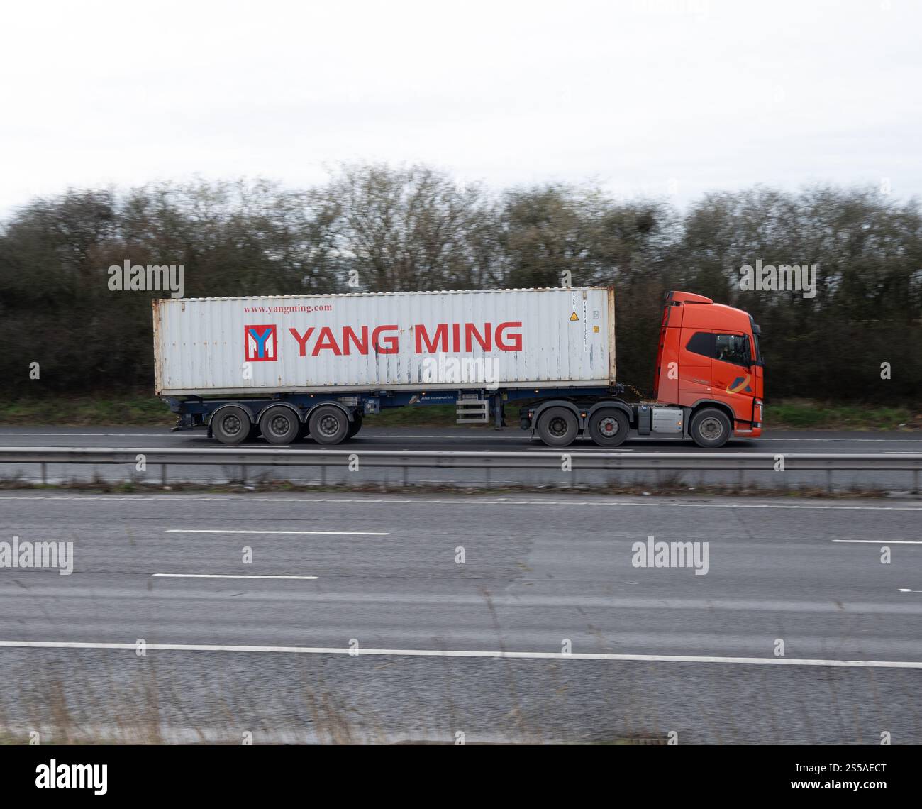 Yang Ming container transported on the M40 motorway, Warwickshire, UK ...