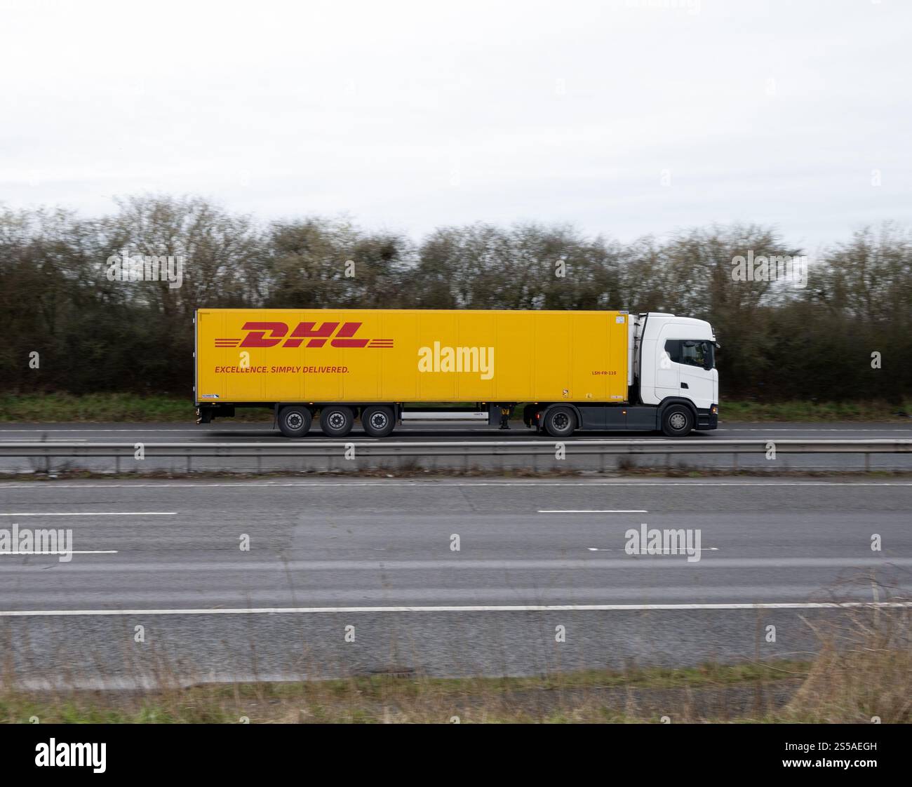 DHL lorry on the M40 motorway, Warwickshire, UK Stock Photo - Alamy