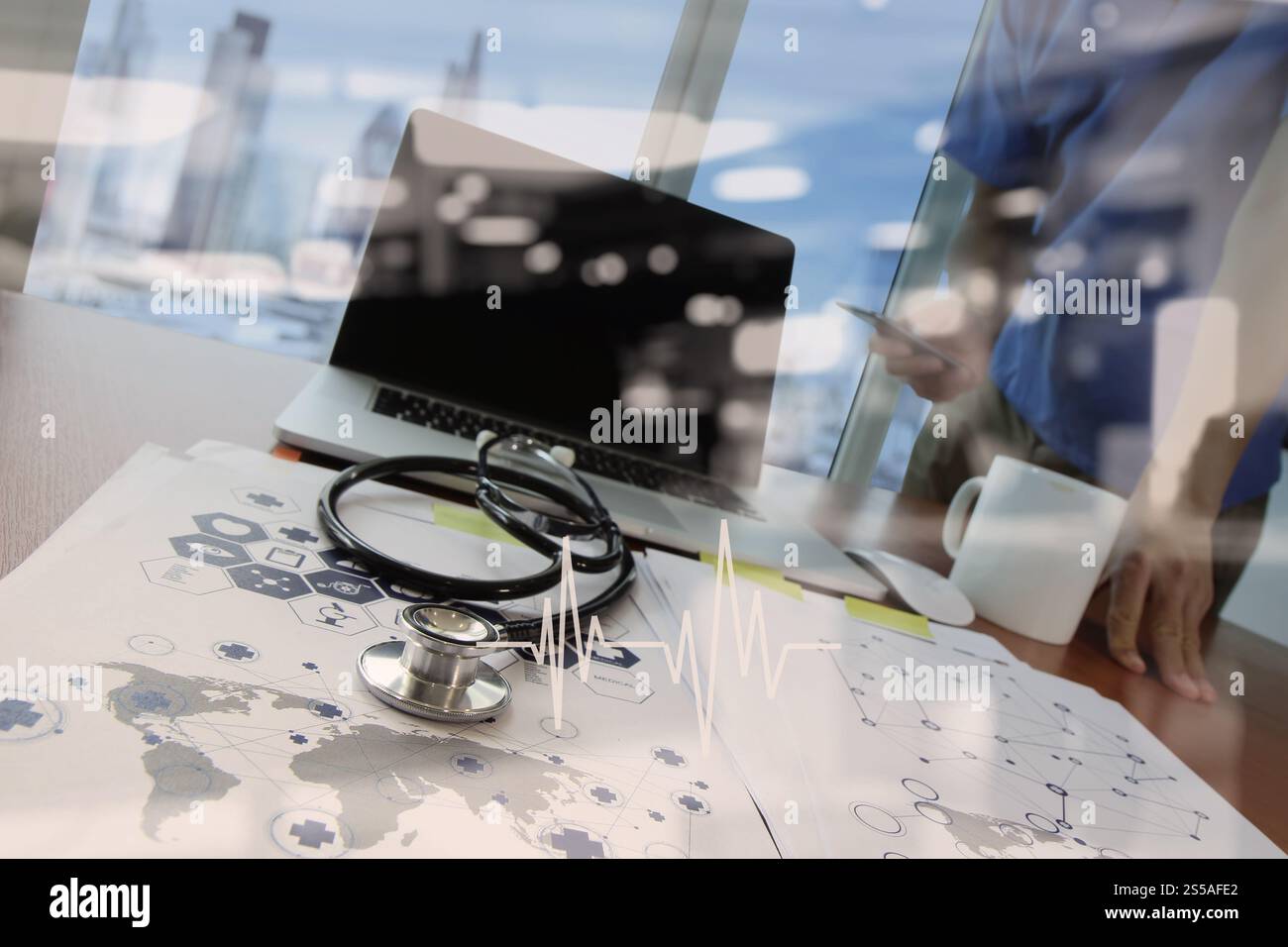 Doctor working with digital tablet and laptop computer in medical ...