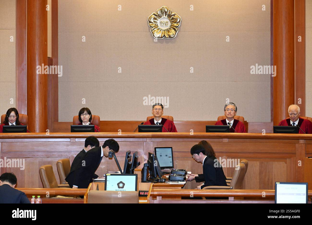 South Korea's Constitutional Court's judges, from left, Jung Jung-mi ...