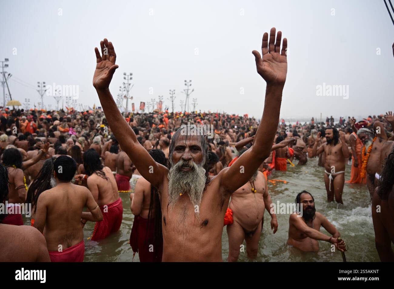 Prayagraj, Uttar Pradesh, India. 14th Jan, 2025. Prayagraj: Sadhus take ...