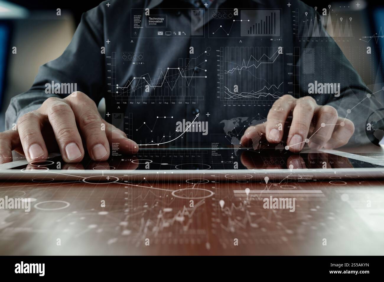 business man hand working on laptop computer with digital layer ...